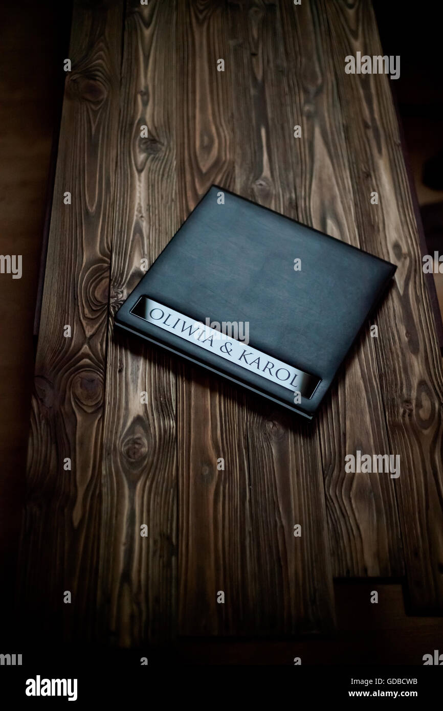 Opened book - photoalbum closeup Stock Photo - Alamy