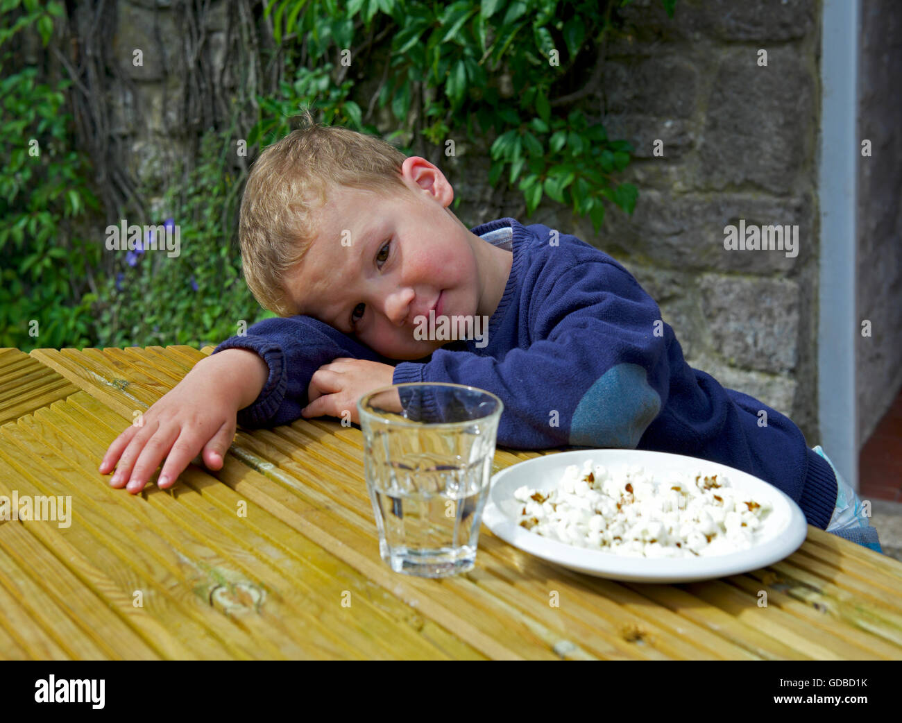 Boy table hi-res stock photography and images - Alamy