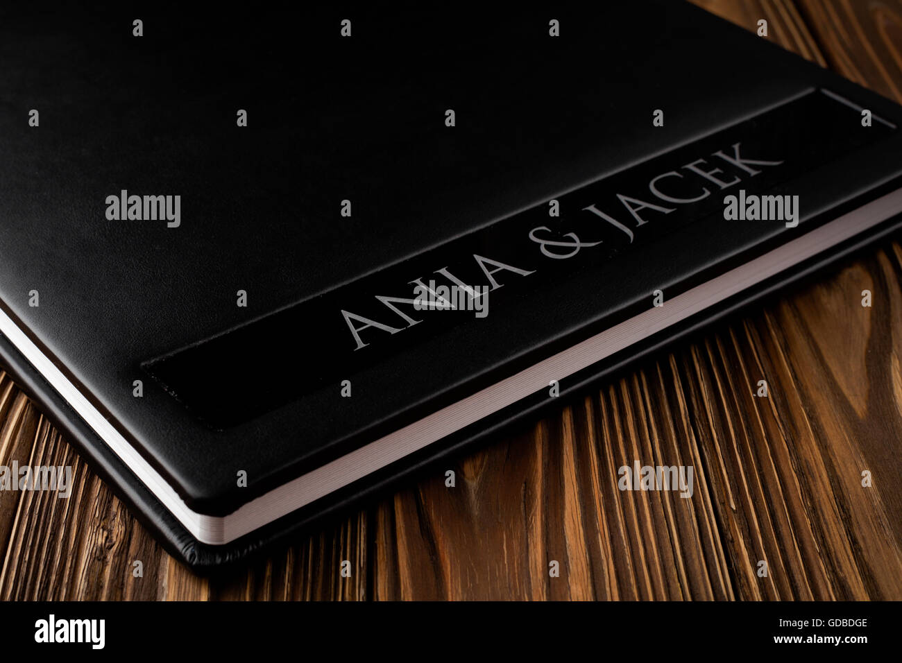 Opened book - photoalbum closeup Stock Photo - Alamy