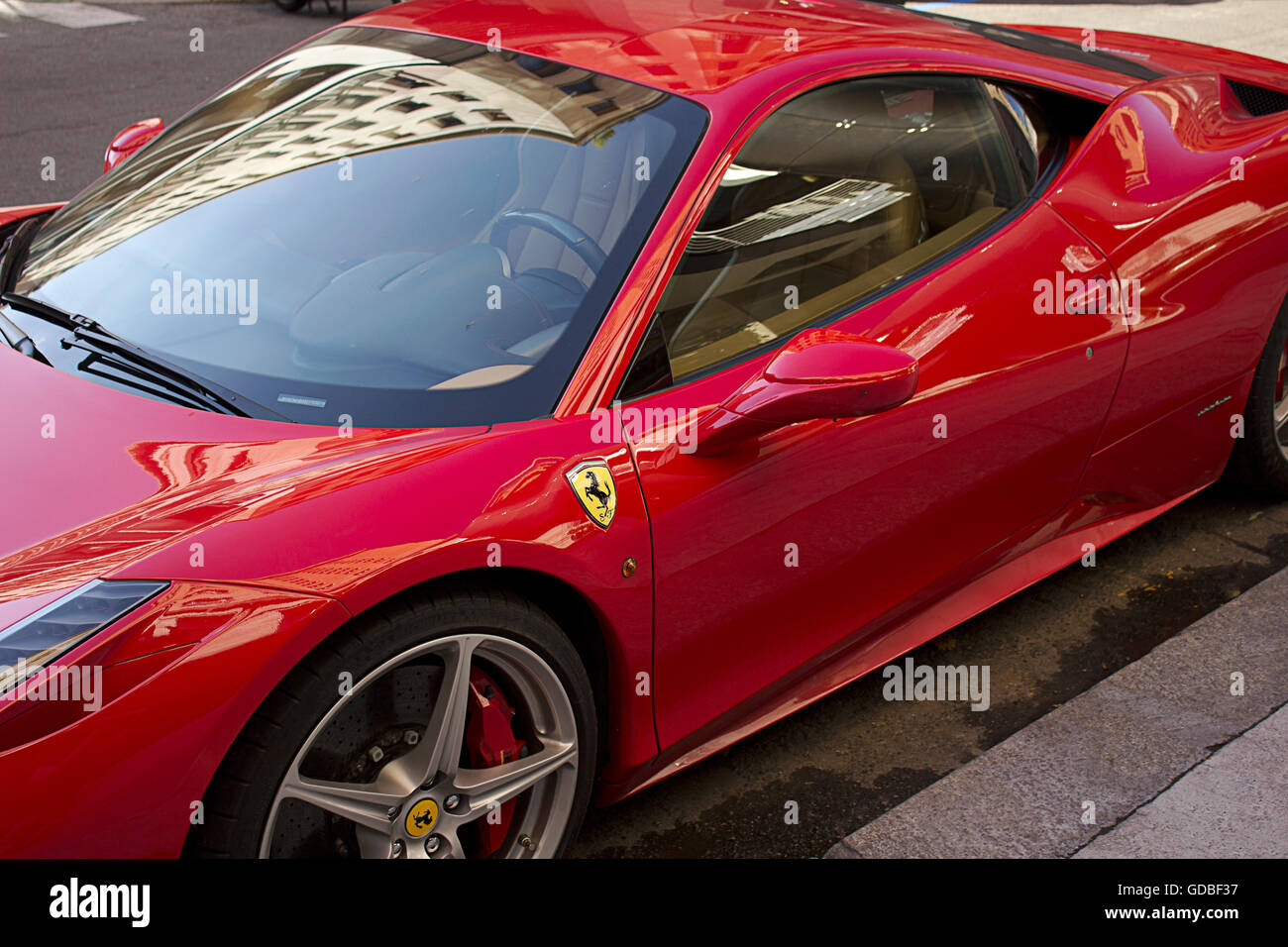 Luxury red Ferrari Italian supercar in front of Principe di Piemonte ...