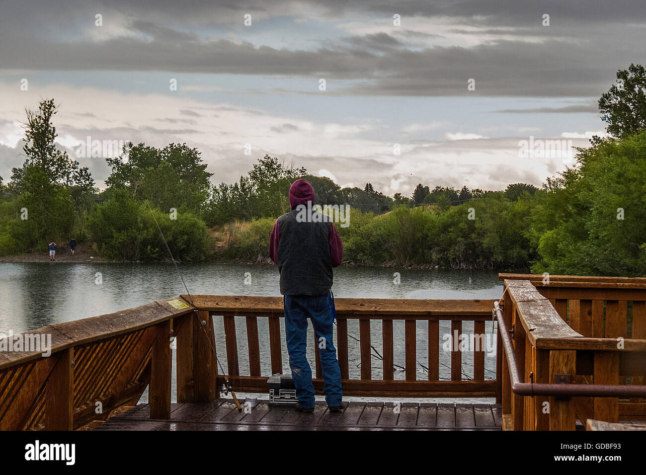 Gone Fishing While Riding Out the Storm Stock Photo - Alamy
