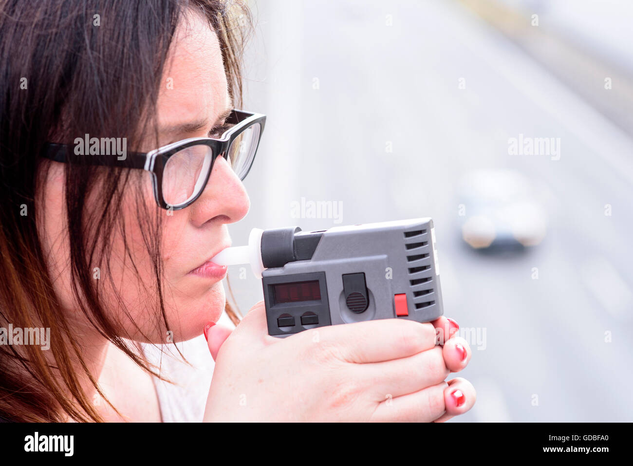 woman investigating on alkom alcohol level Stock Photo - Alamy