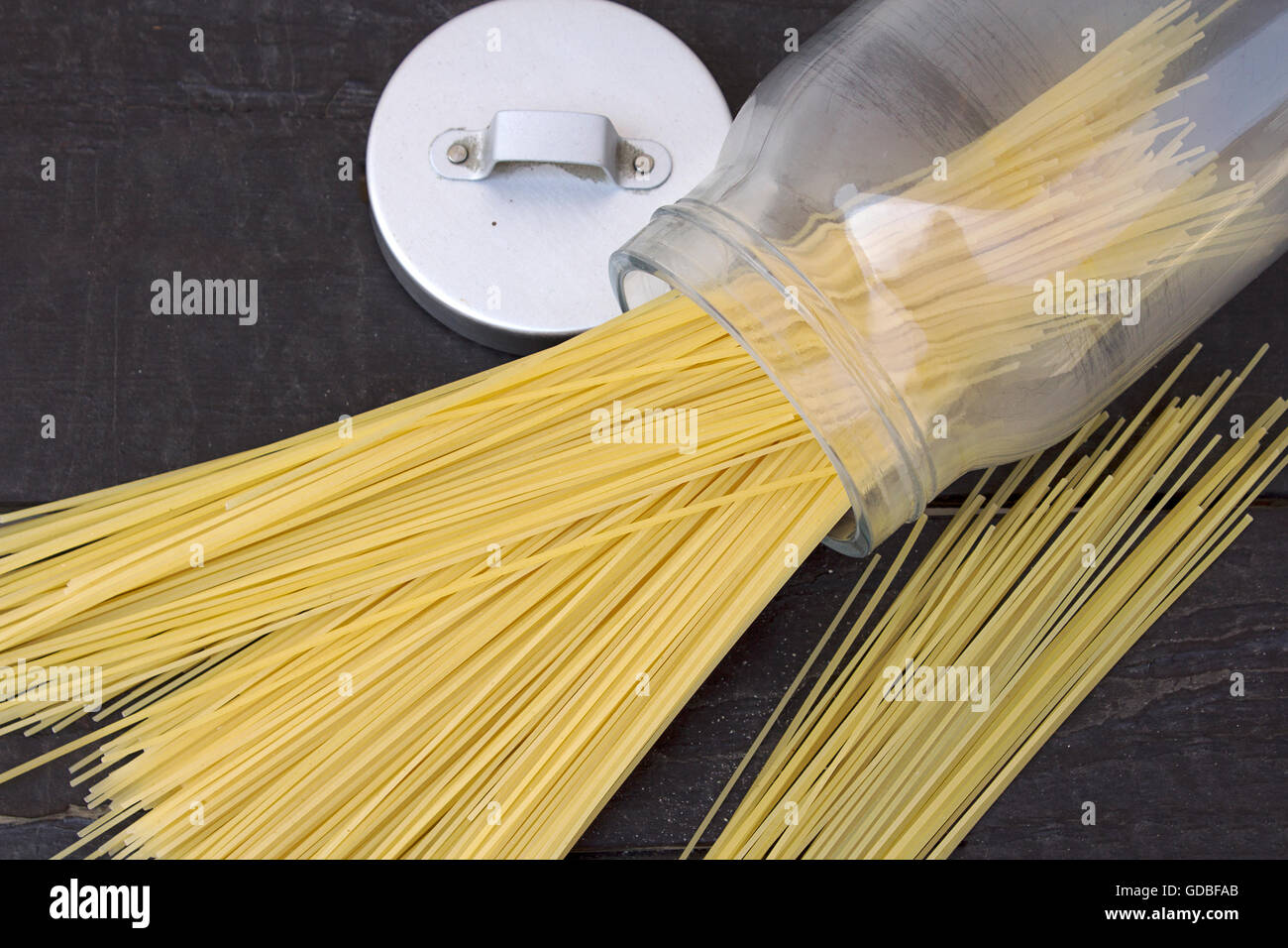 Selection of dried Italian spaghetti pasta on wooden background Stock ...