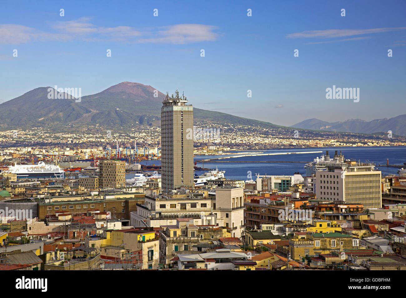 City of Naples with skyscraper, harbor and Mount Vesuvius on the ...