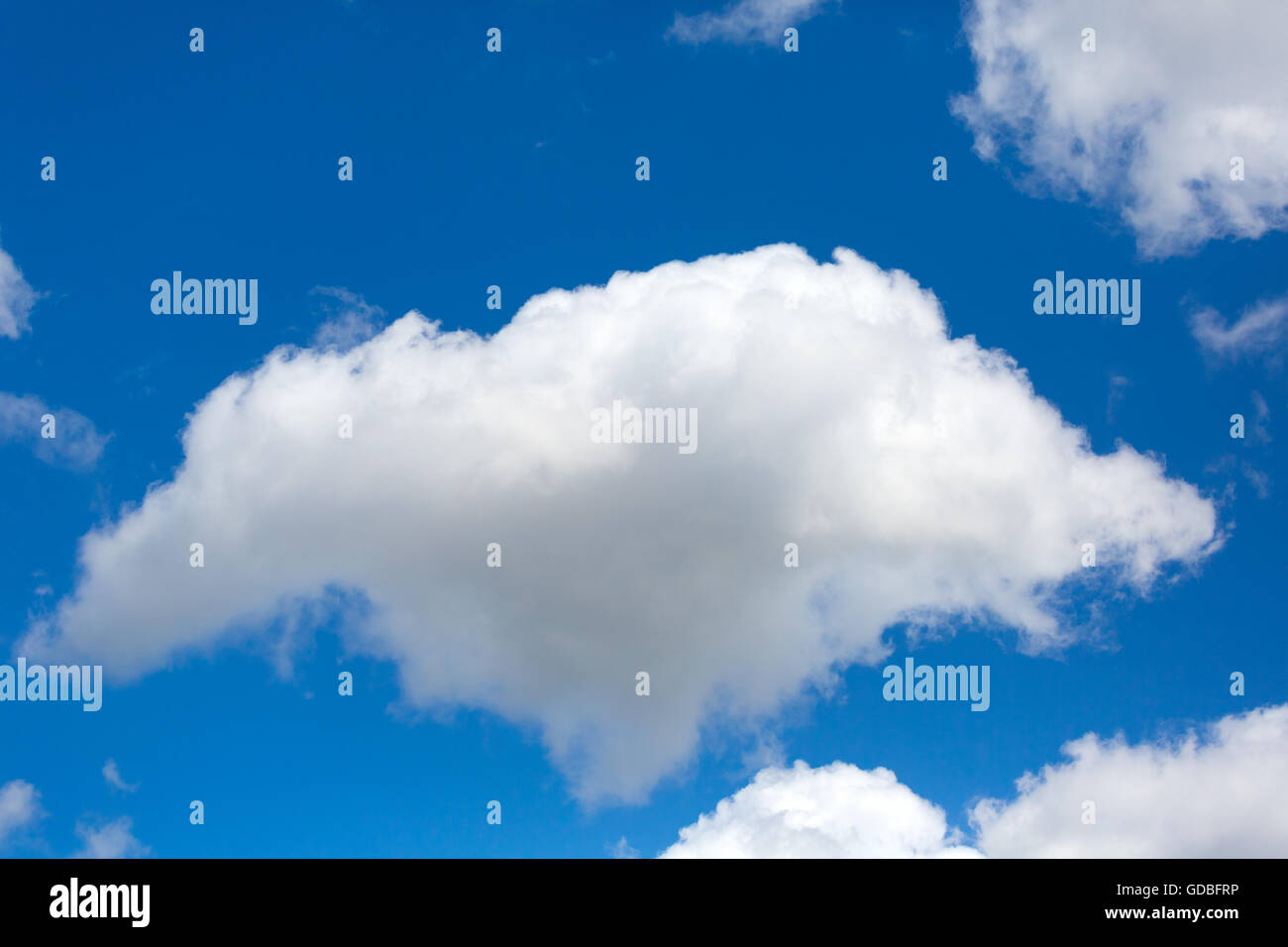 Blue sky seen through a rift in the clouds Stock Photo - Alamy