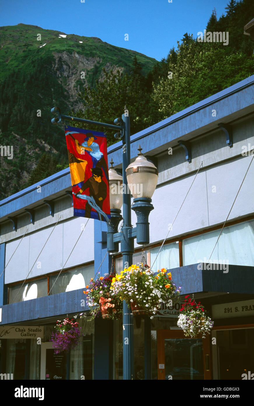 Coloured flag on a lamp post in Juneau, Alaska Stock Photo - Alamy
