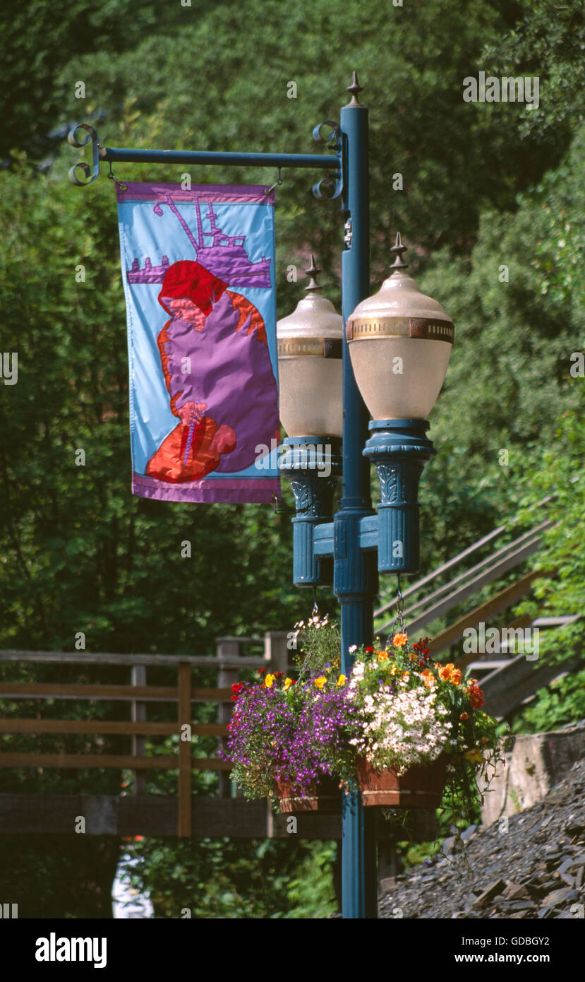 Coloured flag on a lamp post in Juneau, Alaska Stock Photo - Alamy