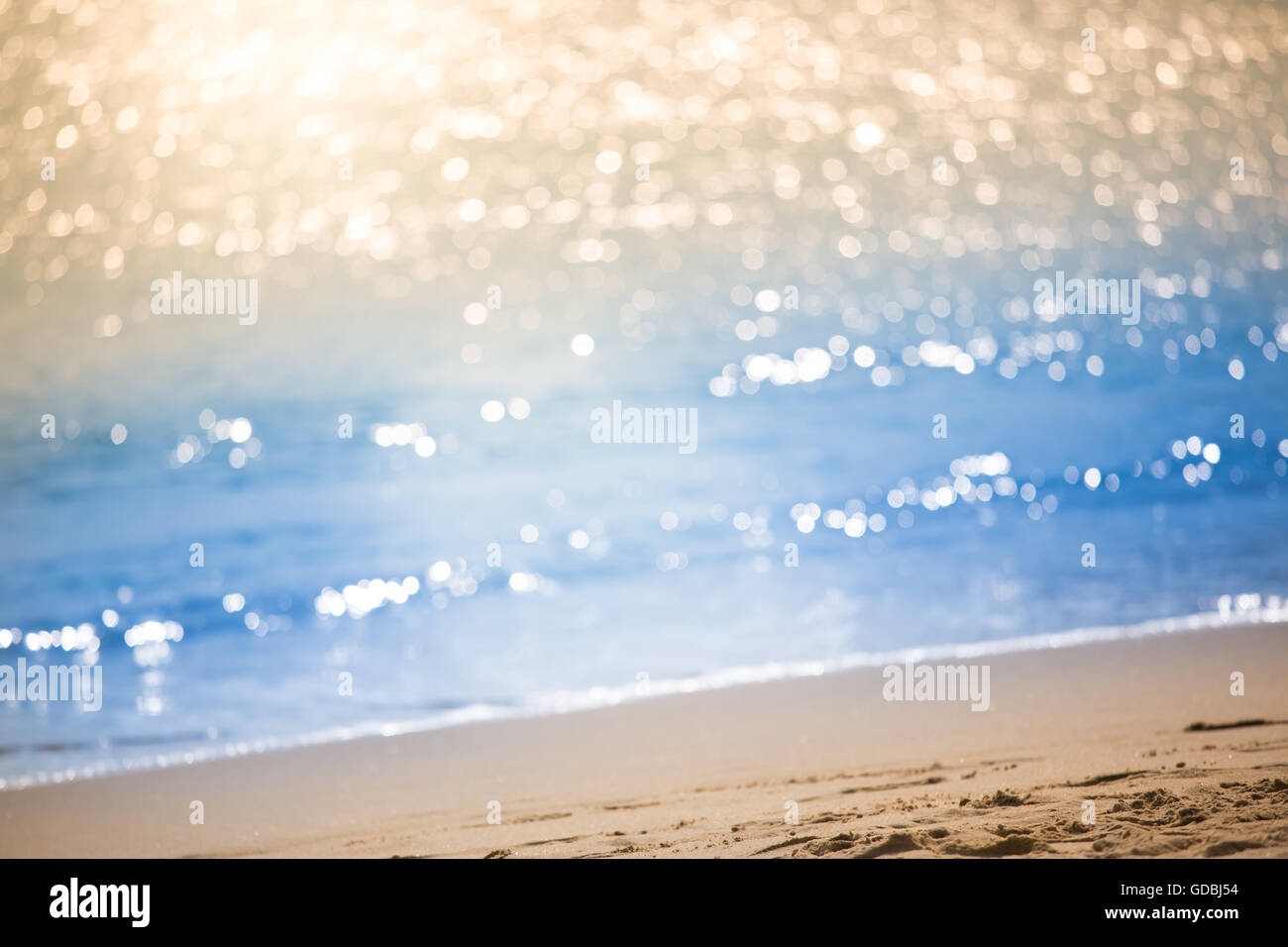 Sunset reflection on beach hi-res stock photography and images - Alamy