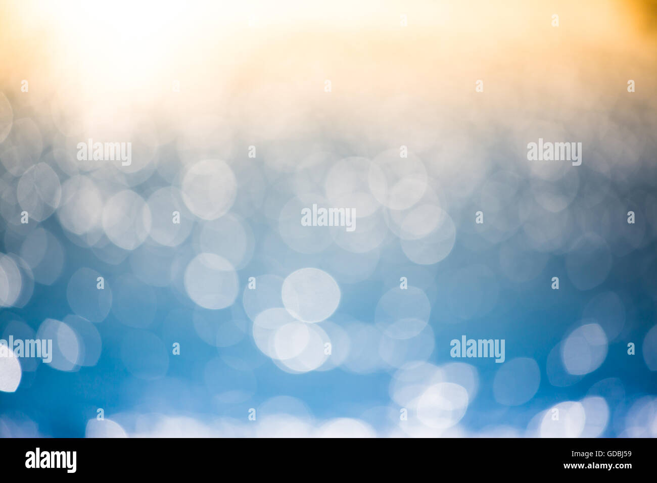 Sunset reflection on beach Stock Photo - Alamy