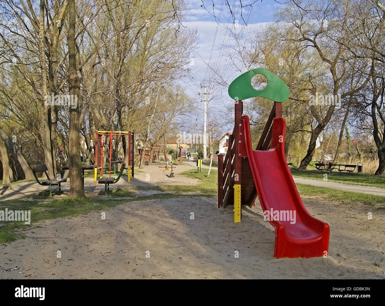 A colorful children's chute in the playground Stock Photo - Alamy