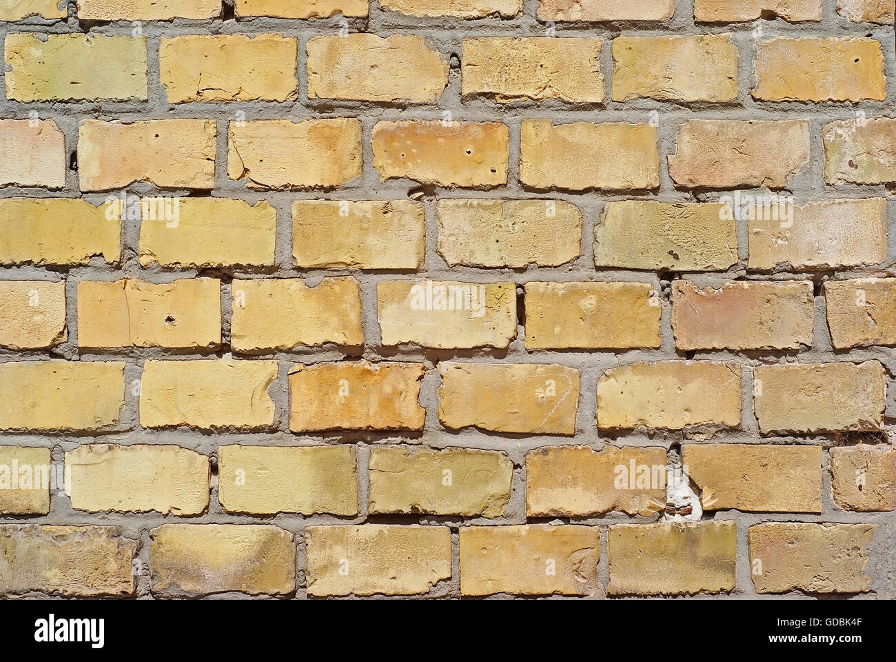 An old yellow brick wall Stock Photo - Alamy