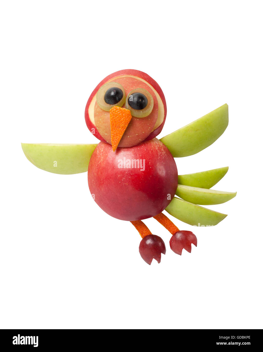 Flying bird made of apple on isolated background Stock Photo - Alamy