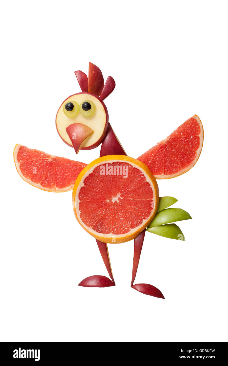 Amusing chicken made of fruits on isolated background Stock Photo - Alamy