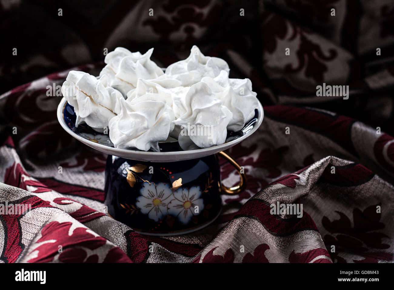 home white marshmallow meringue in retro style Stock Photo - Alamy