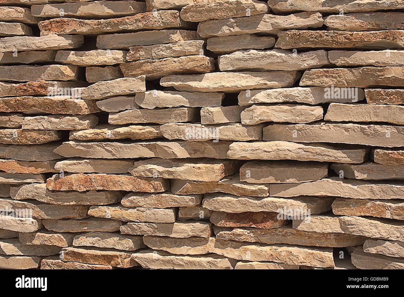 Background of a layer of stones Stock Photo - Alamy