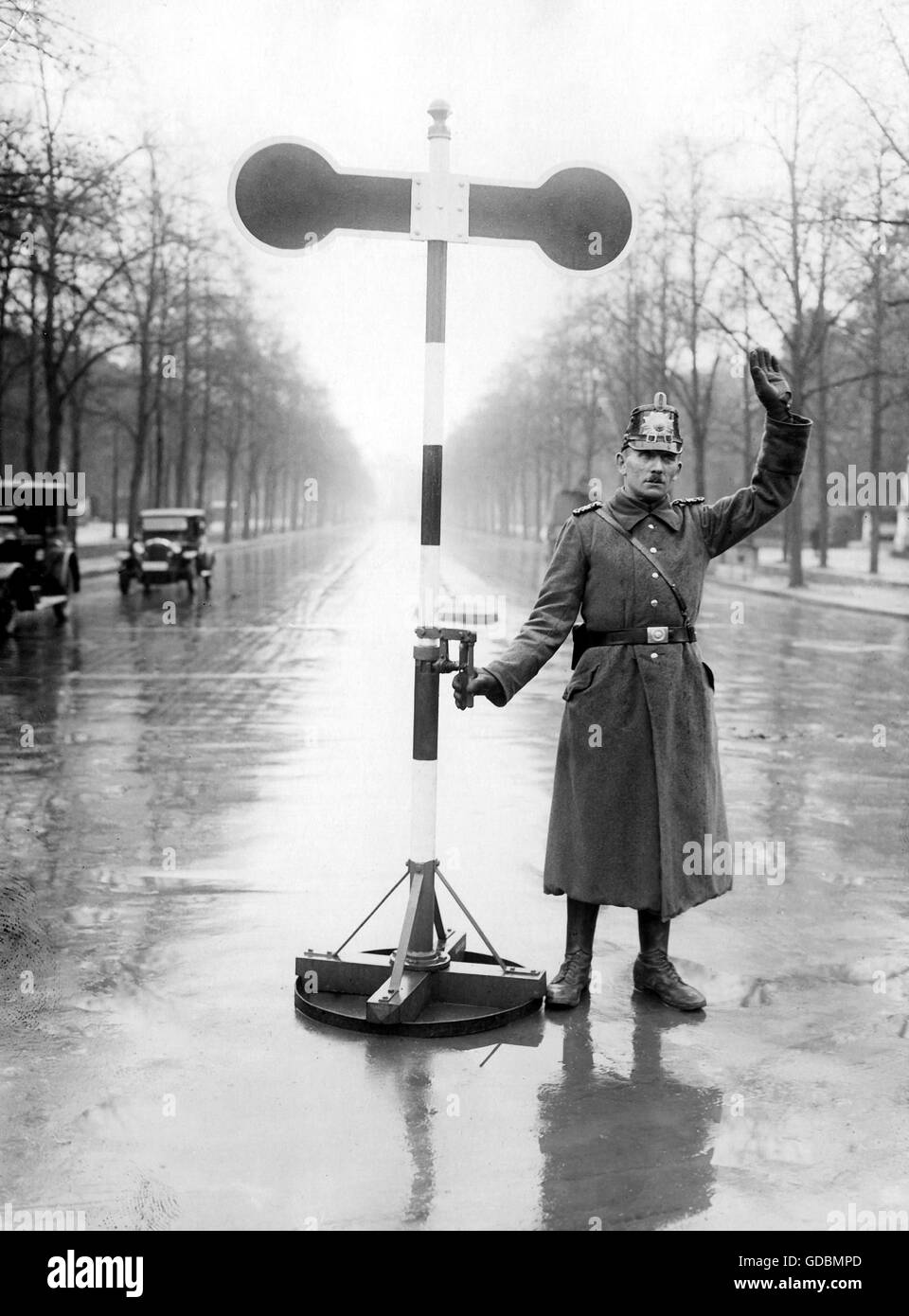 Traffic policeman stop hand signal Black and White Stock Photos ...