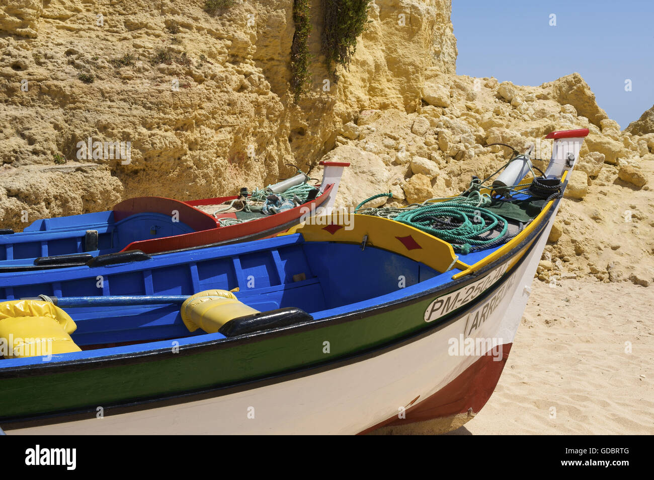 Traditional fishing boats in carvoeiro hi-res stock photography and ...