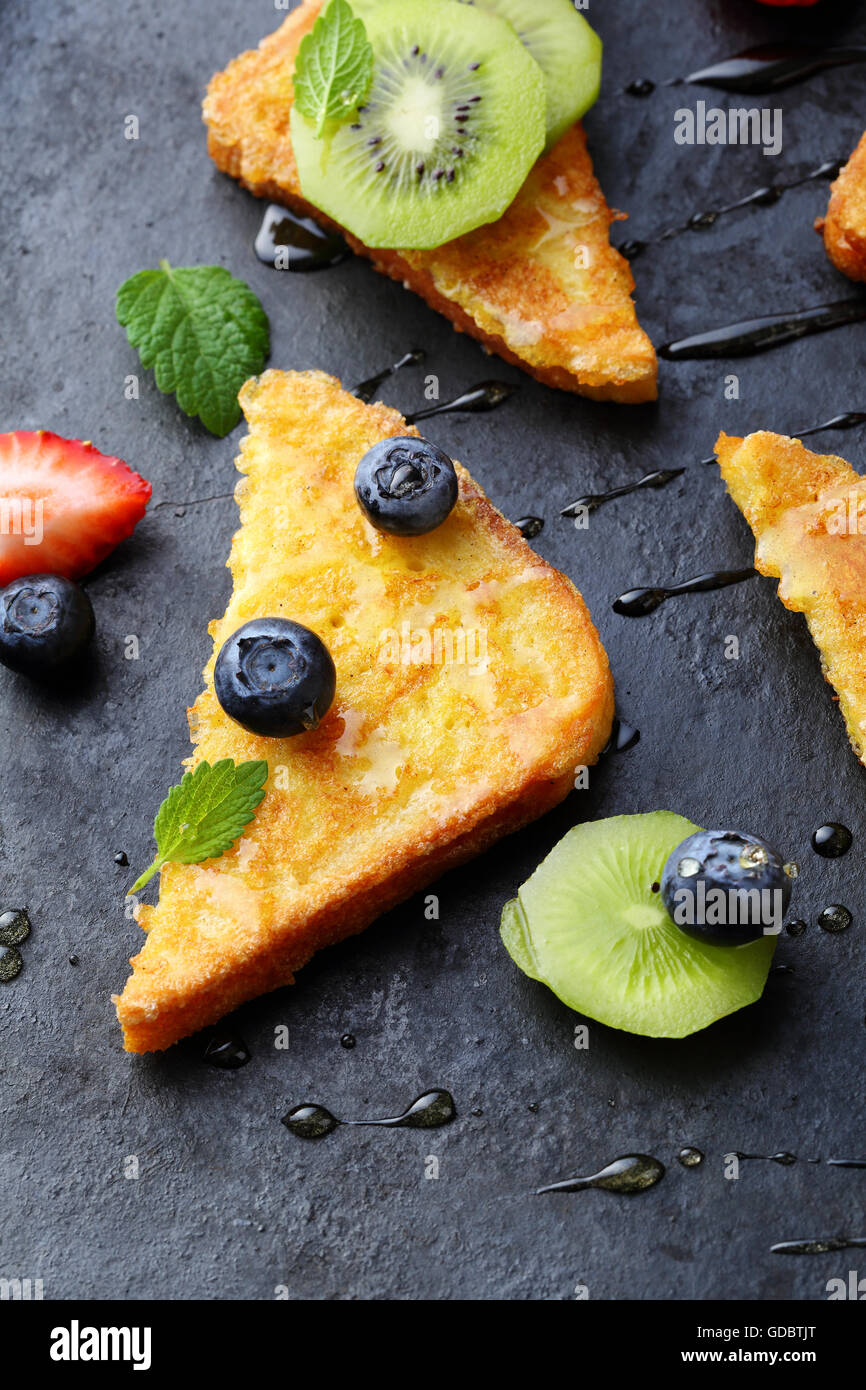 toasts with fruits and honey, food close-up Stock Photo - Alamy