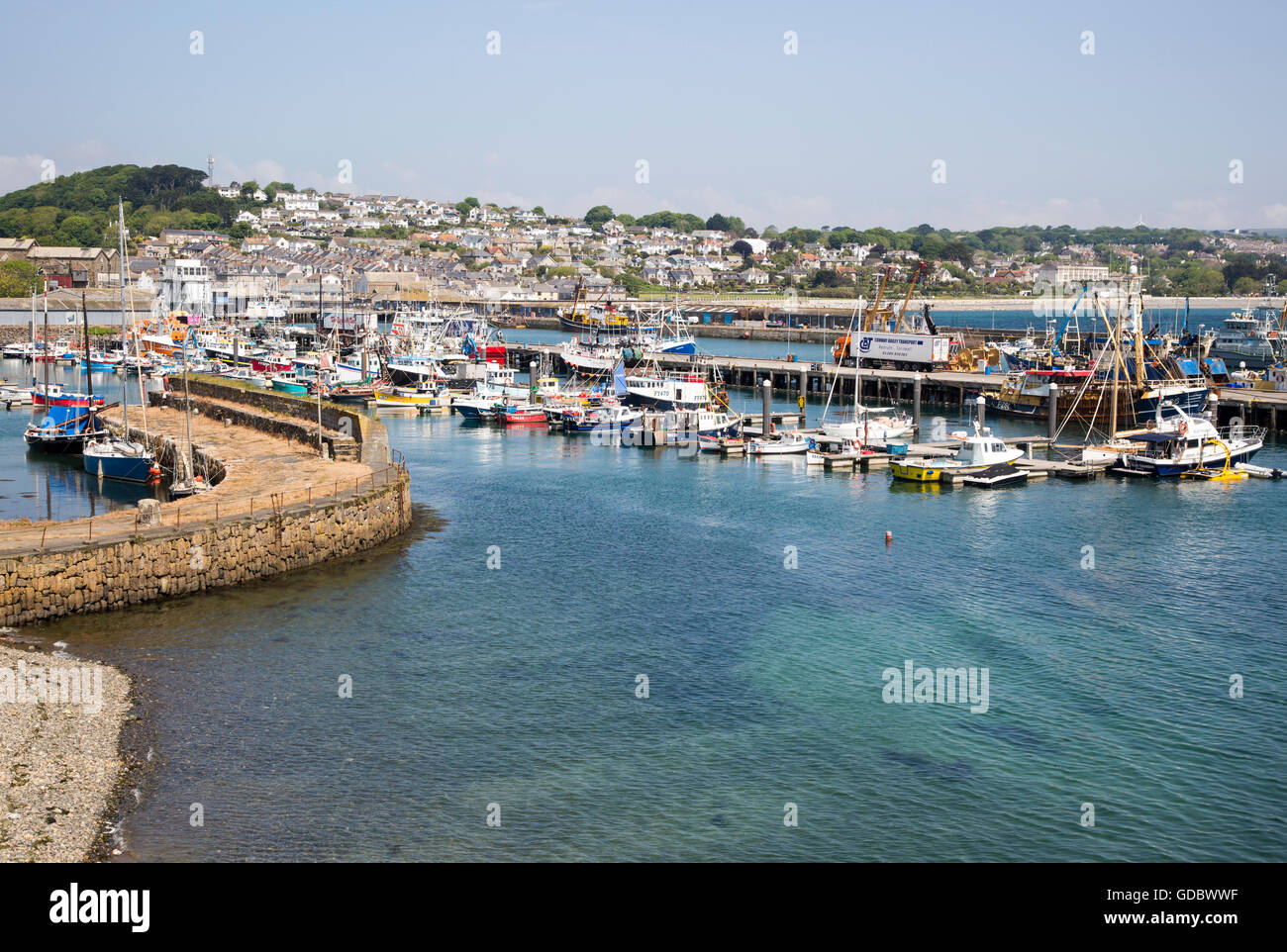 Boats at moorings in the harbour of fishing port of Newlyn, Cornwall ...