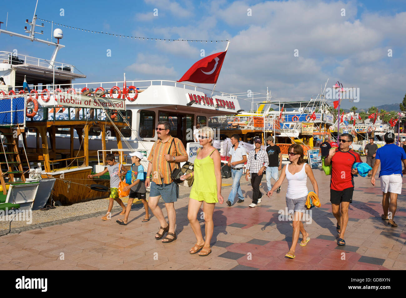 Tourists at the lakeside promenade of marmaris hi-res stock photography ...