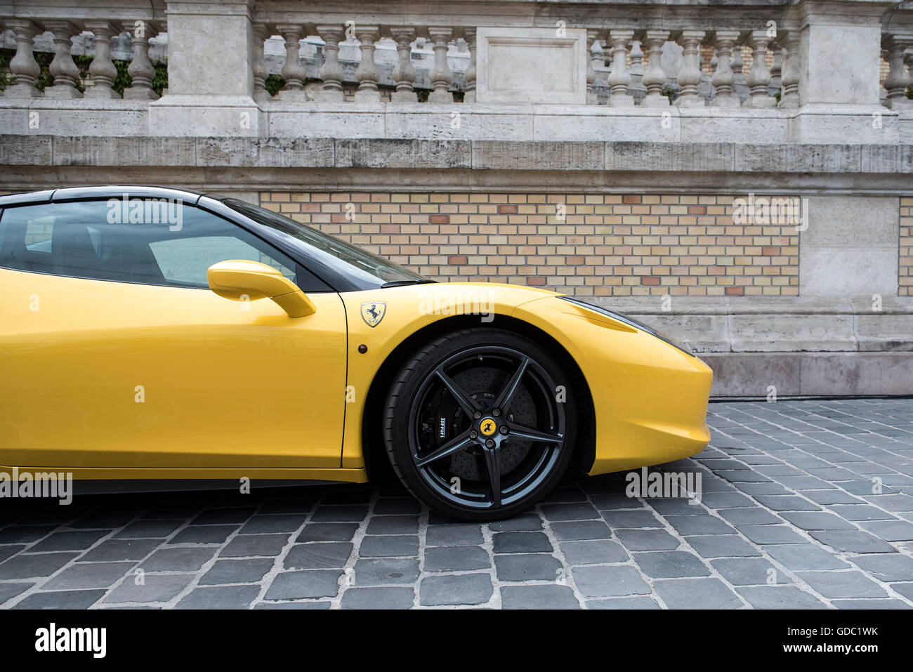 A yellow Ferrari 458 parked at the city of Budapest, Hungary Stock ...