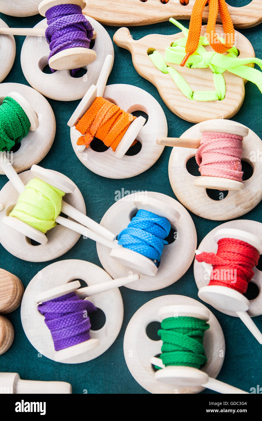 colorful wooden spool for sewing on background Stock Photo - Alamy