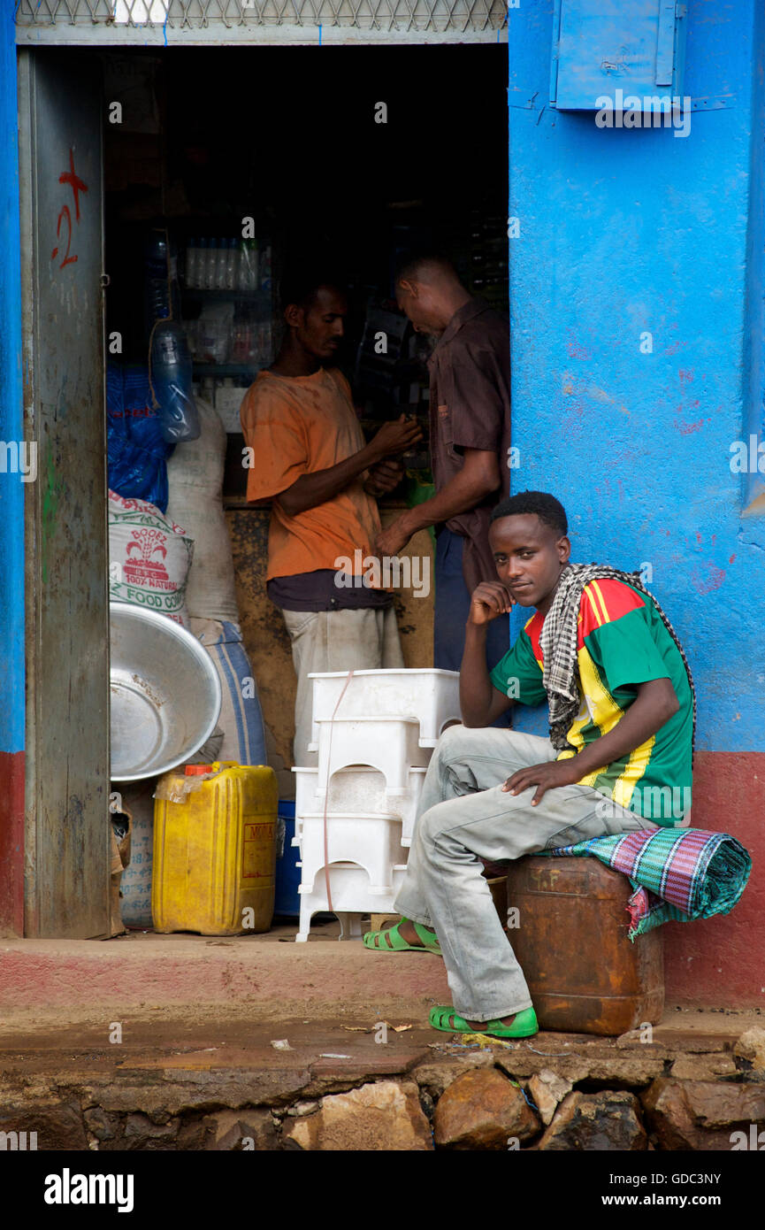 Ethiopian shop and man sitting outside, Addi Arkay, Amhara, Ethiopia ...