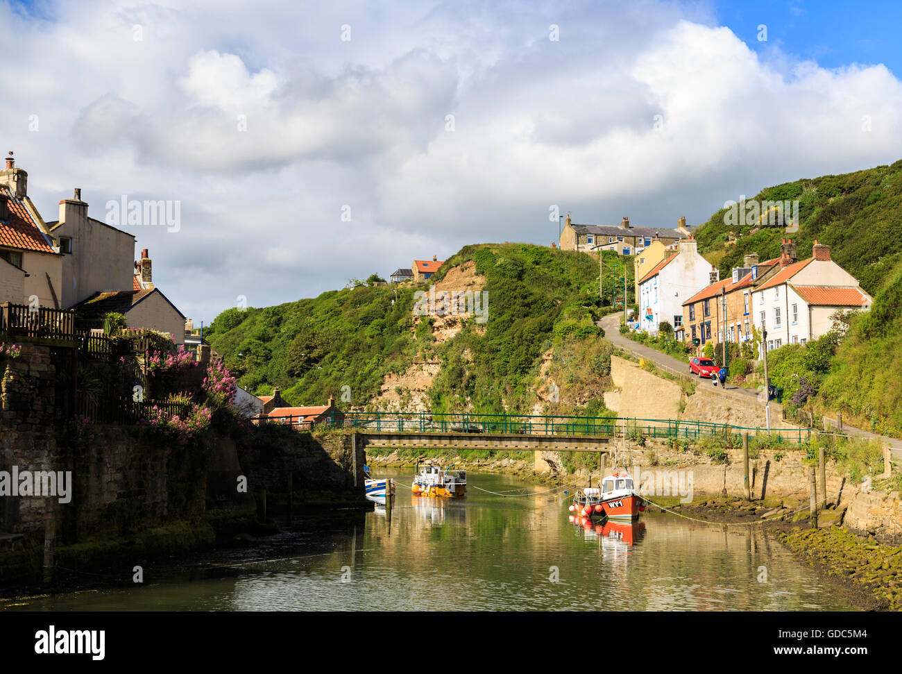 Fishing boats moored up in Staithes beck. In Staithes, North Yorkshire ...