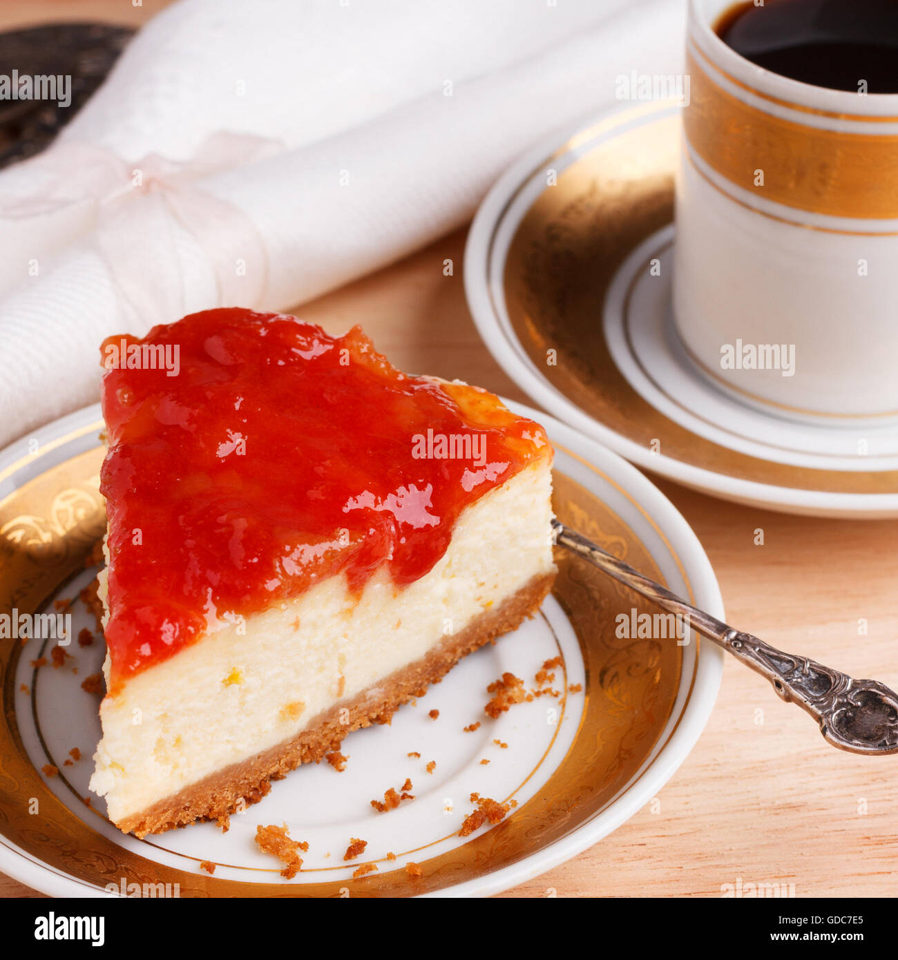 Cheesecake with brazilian goiabada jam of guava on white gold vintage ...