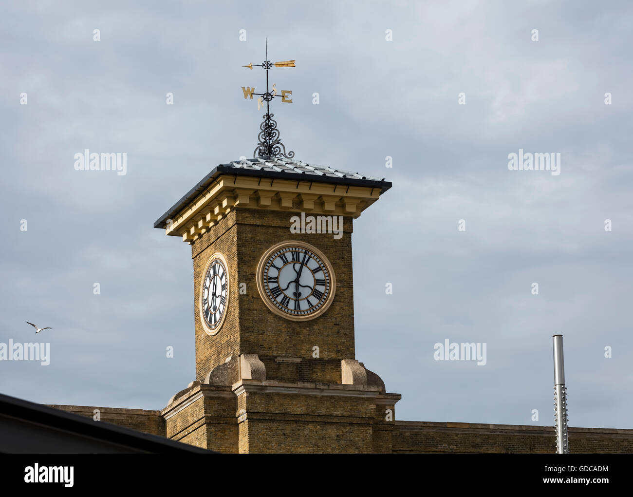Clock and tower at Kings Cross Station in London Stock Photo - Alamy