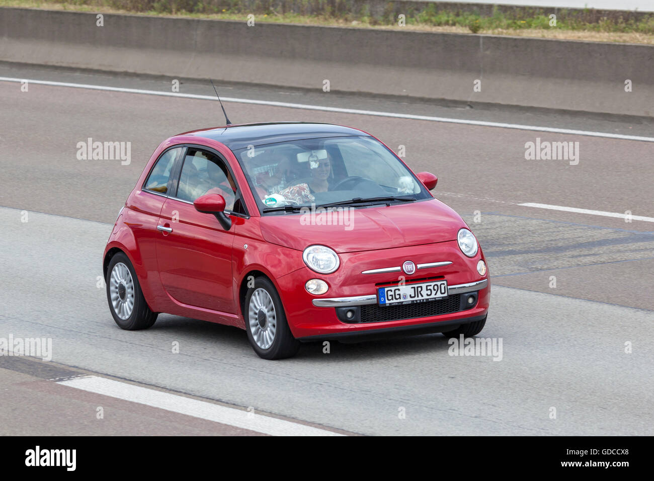 Woman driving fiat 500 hi-res stock photography and images - Alamy