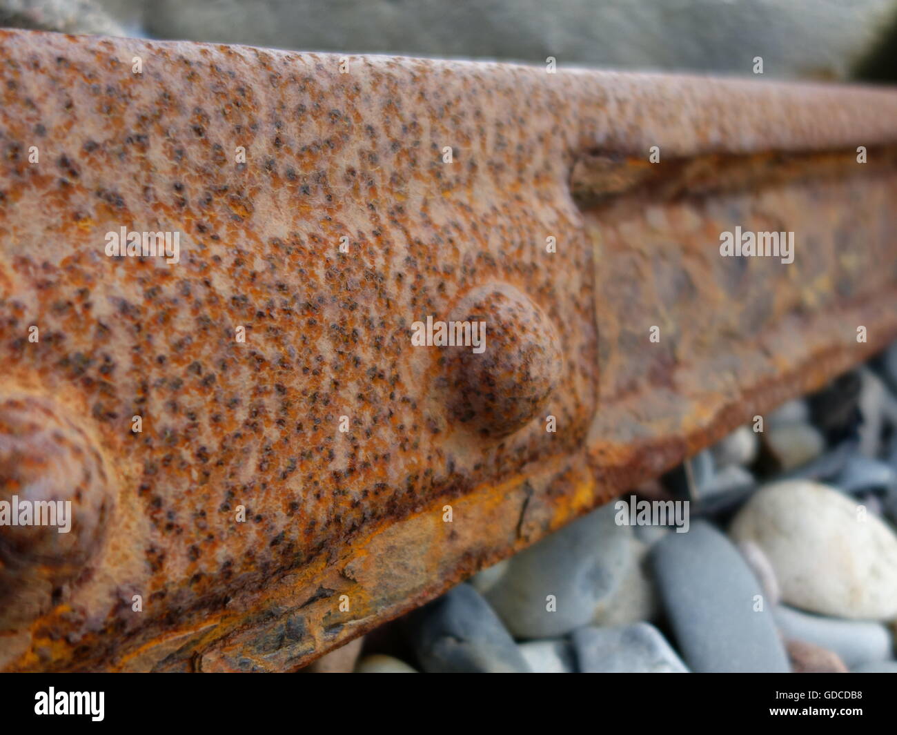 Rusty metal on a beach Stock Photo - Alamy