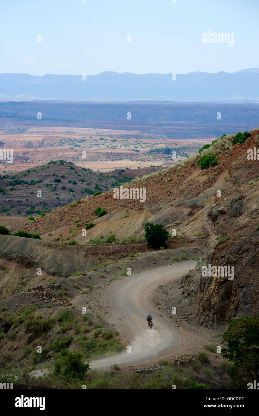 Lone motorcyclis on a dusty road between Debre Zebit and Lalibela ...