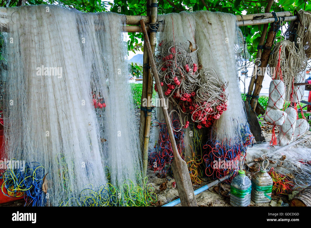 Hanging fishing nets and fishing tackle near beach, southern Thailand ...