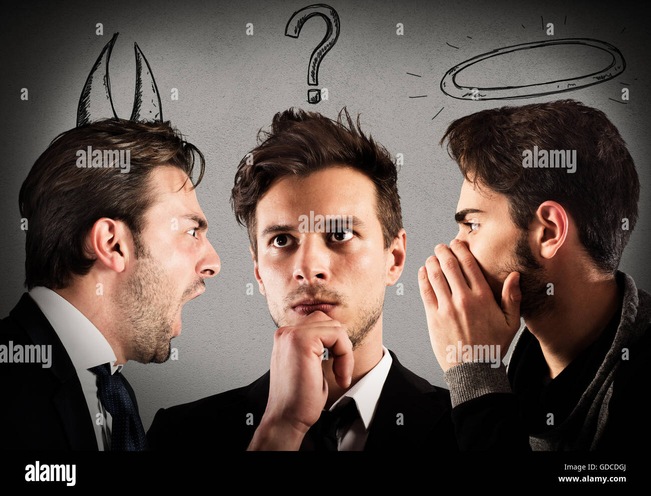 Listen to the angel or the devil Stock Photo - Alamy