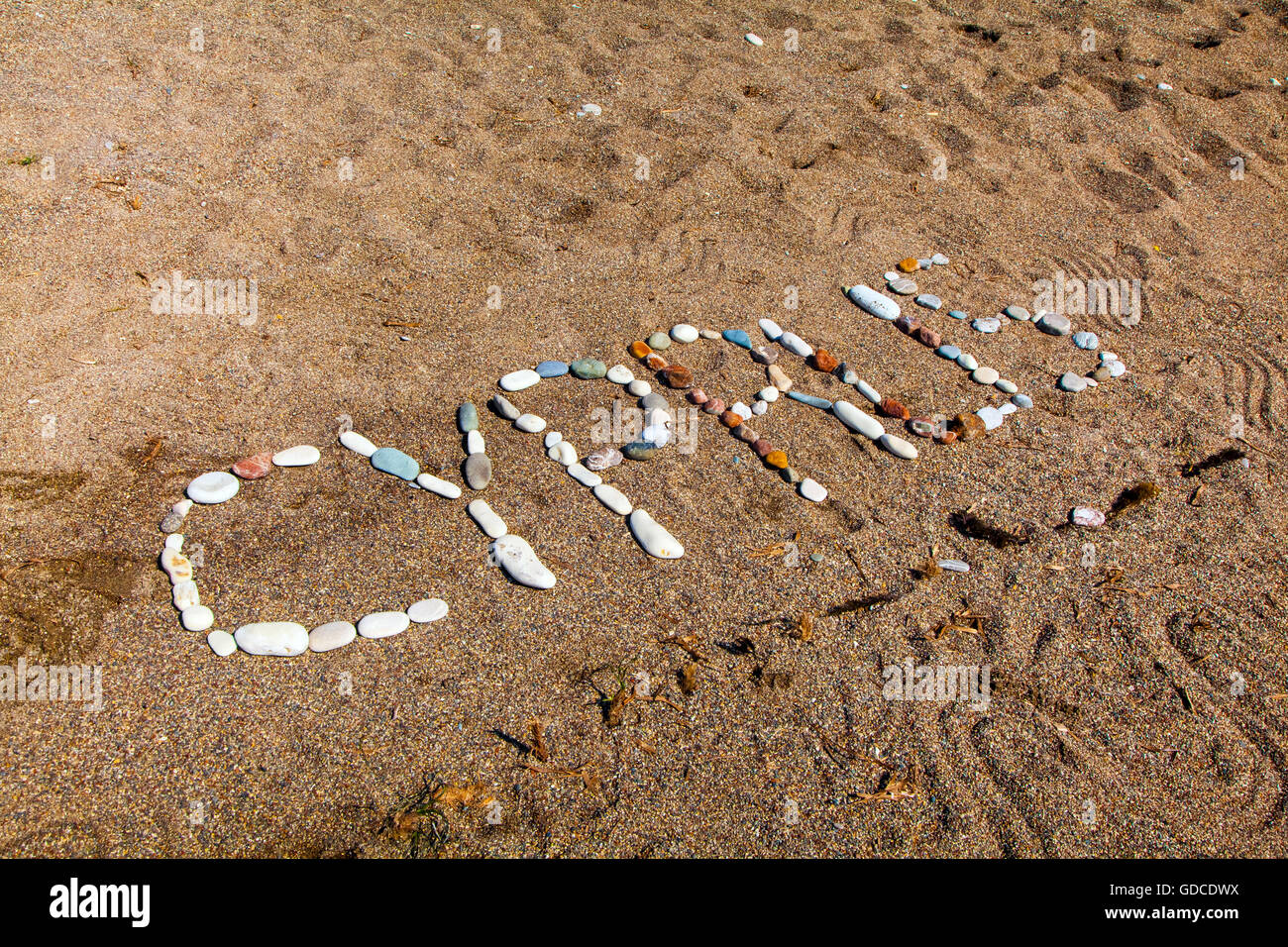 Sign Cyprus on the sand Stock Photo - Alamy
