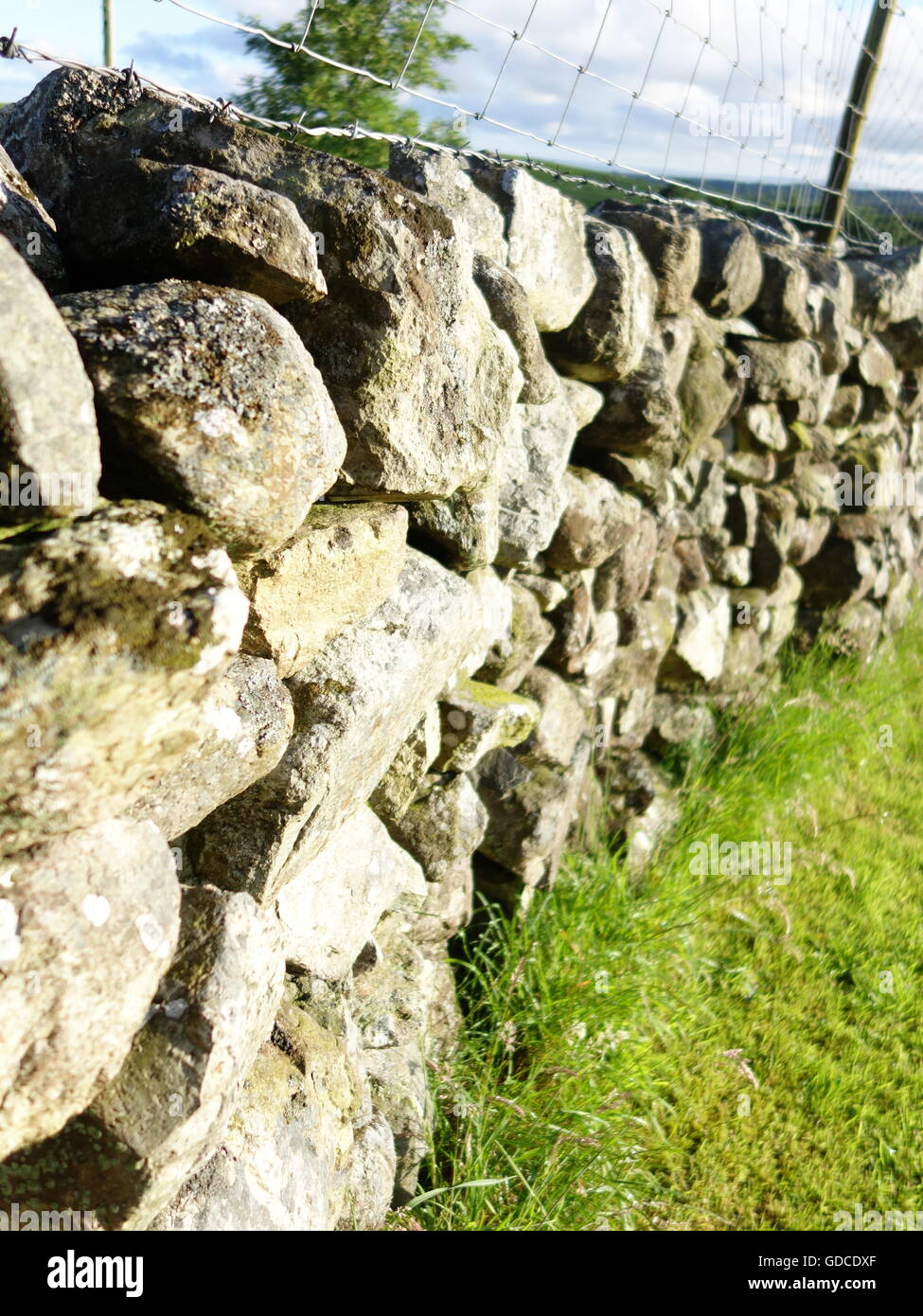 An old stone wall Stock Photo - Alamy