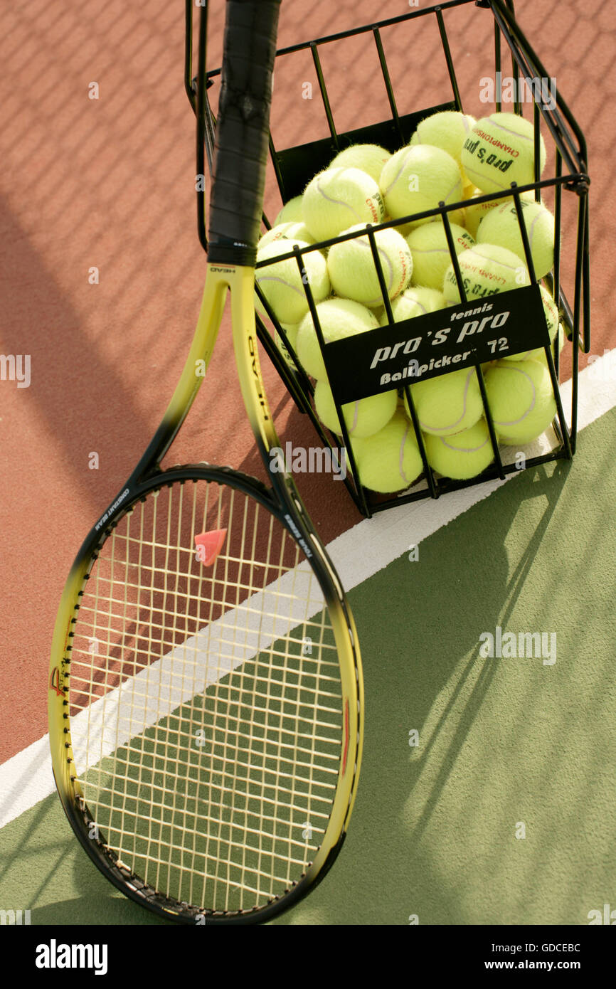 Tennis racket and tennis balls Stock Photo - Alamy
