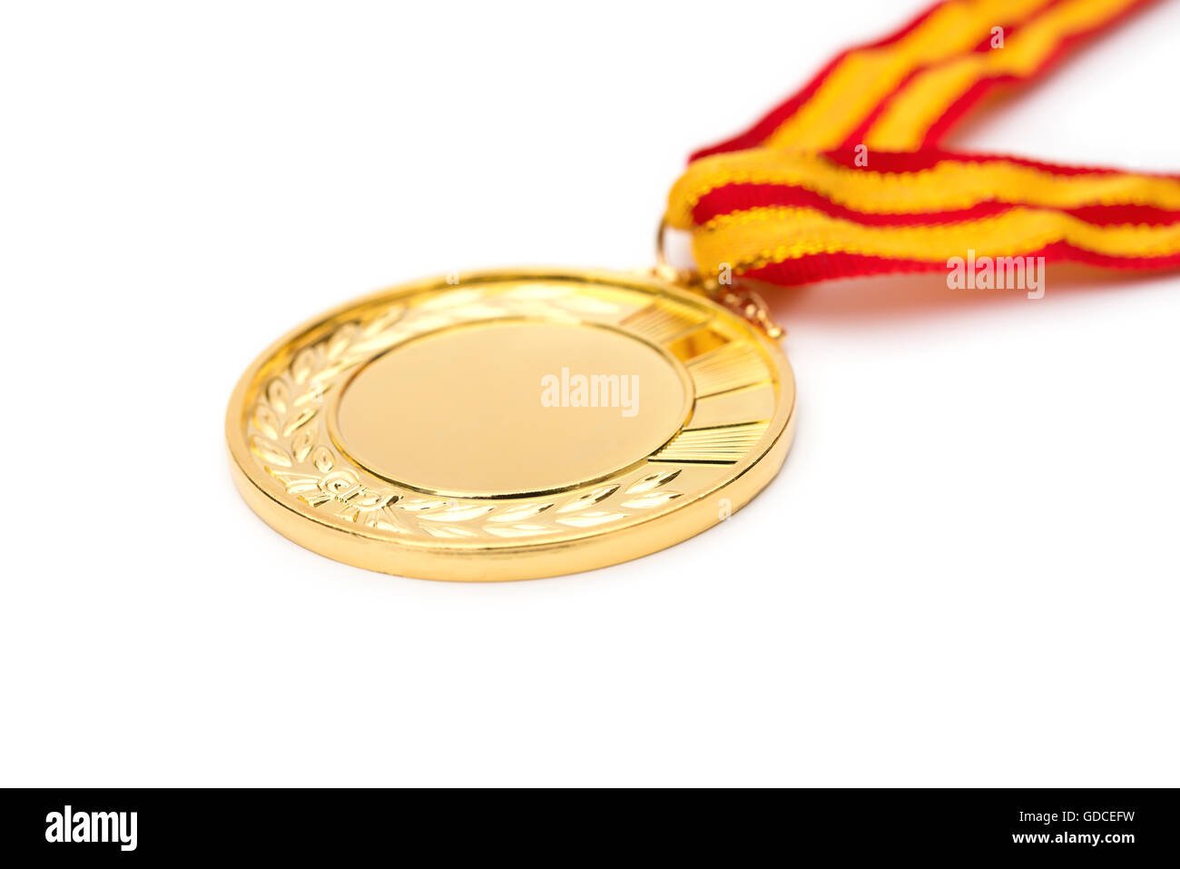gold medal on a white background close up Stock Photo - Alamy
