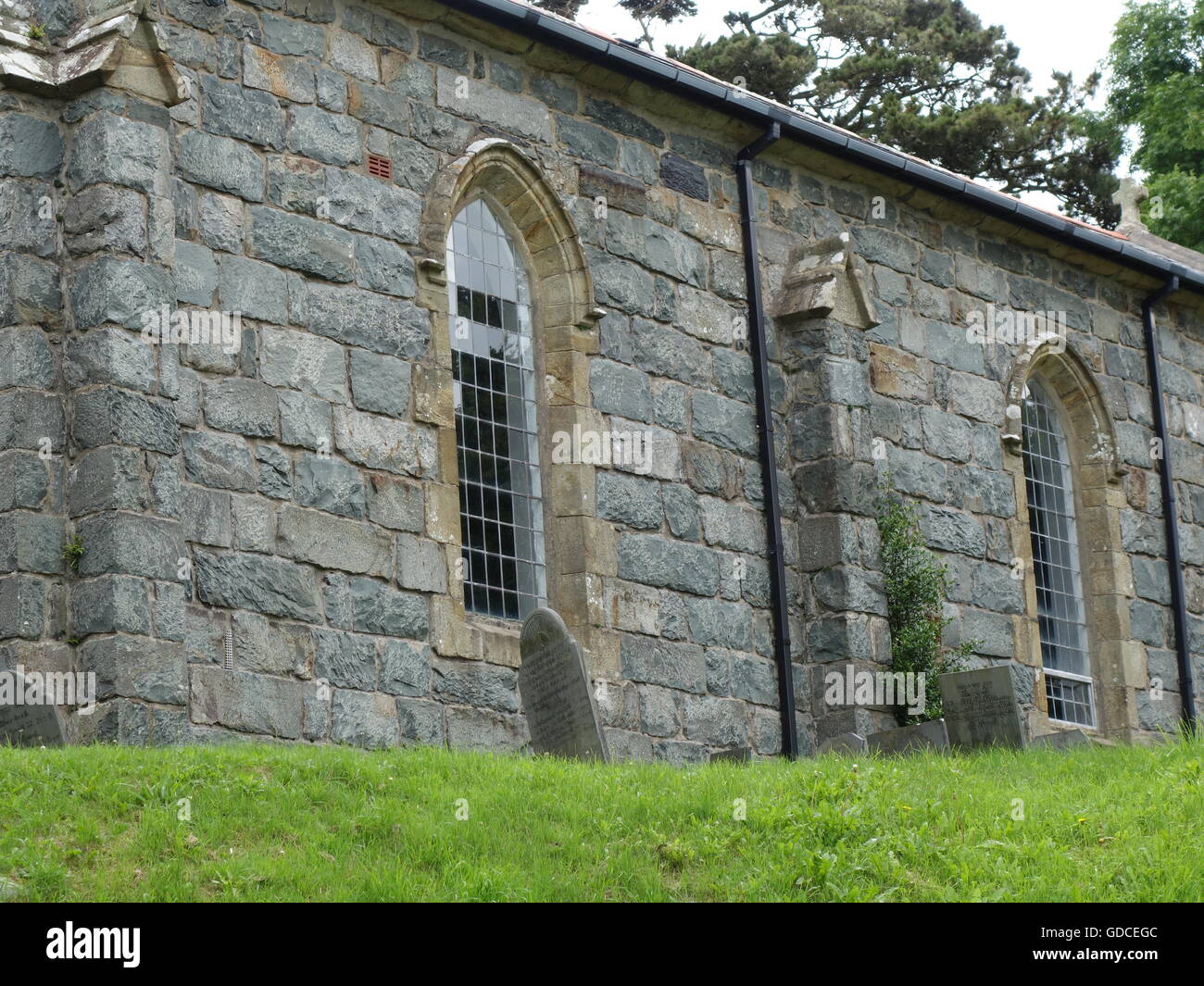 The windows and stone of an old building Stock Photo - Alamy