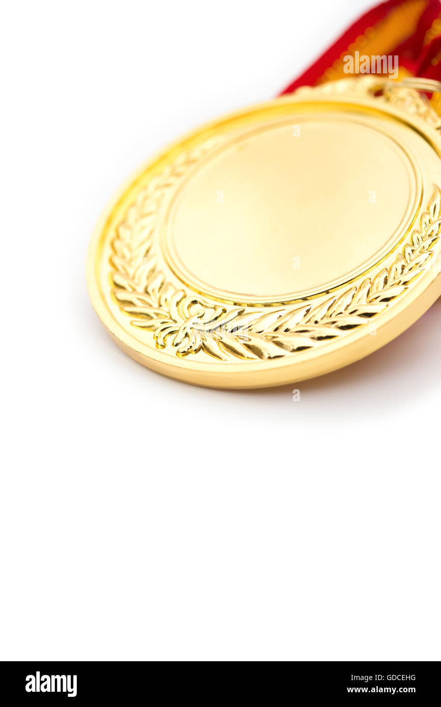 gold medal on a white background close up vertical Stock Photo - Alamy
