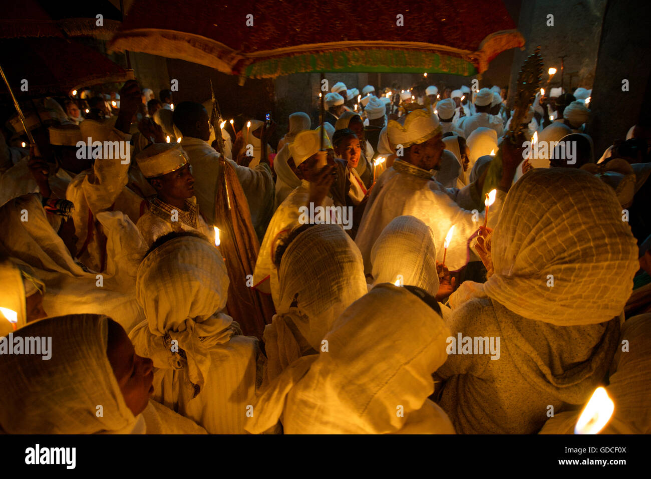 Ethiopian pilgrims and priests celebrating Fasika in the church of Bet ...