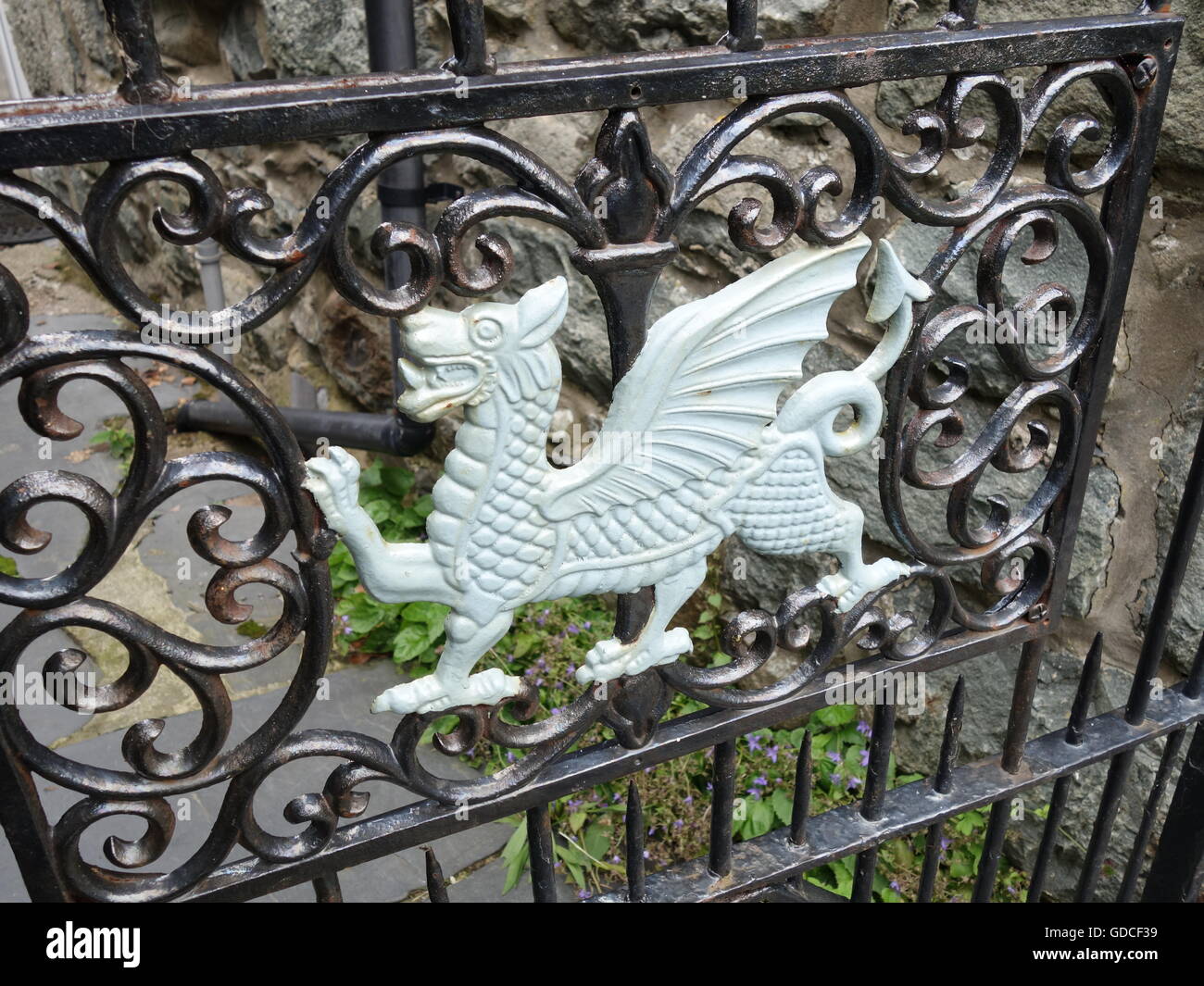 A welsh dragon design on the front of a gate Stock Photo - Alamy
