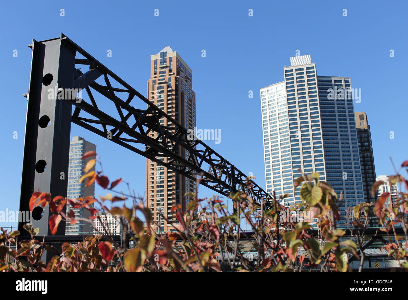 A steel structure running over the train tracks that feed into ...