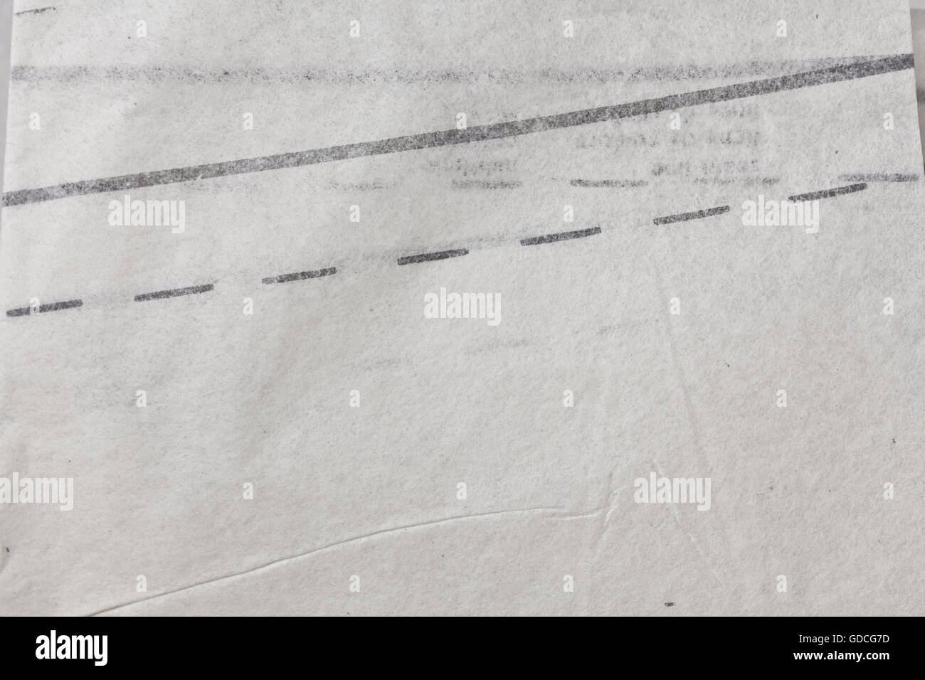 Sewing pattern on thin paper background Stock Photo - Alamy