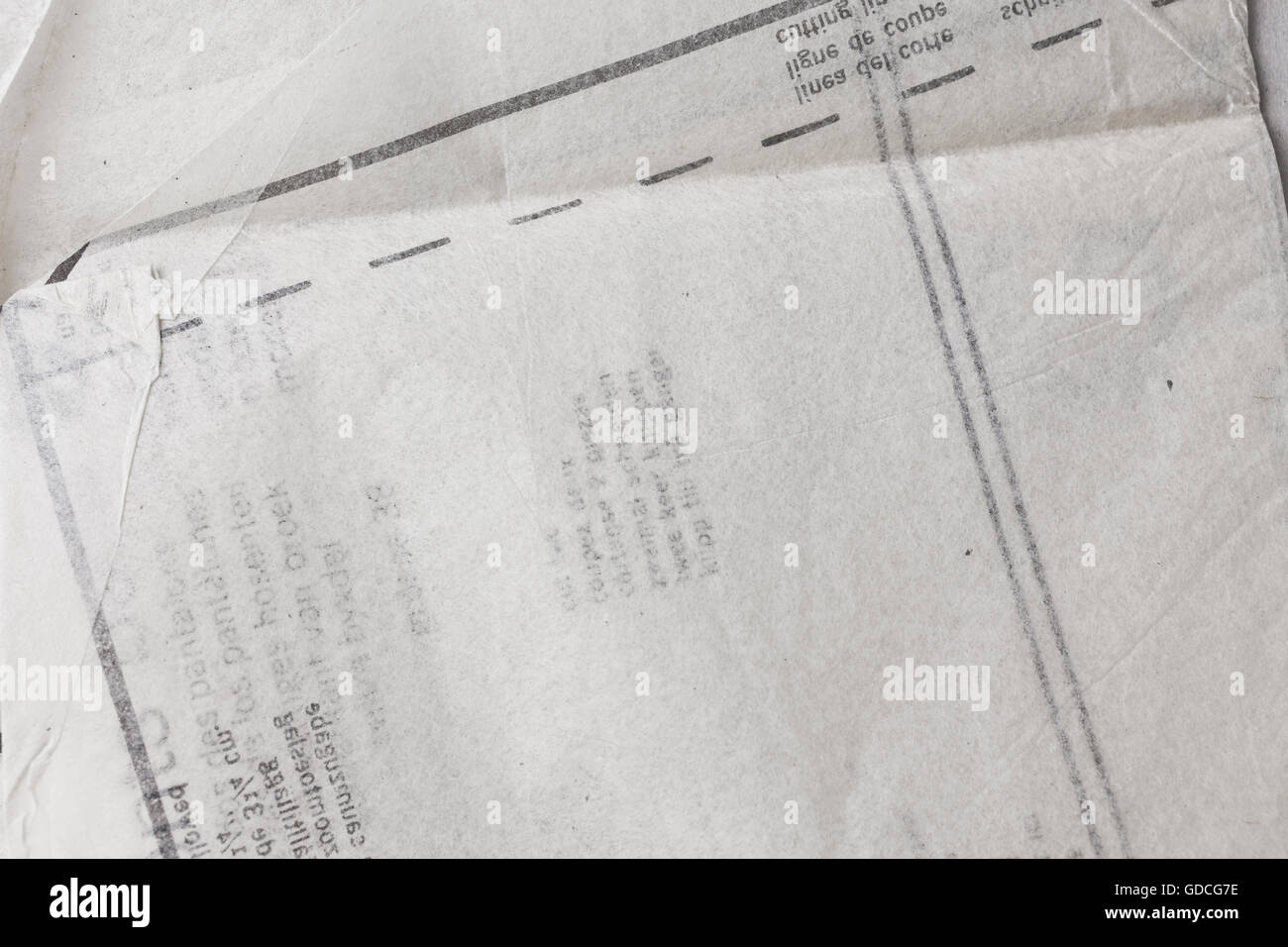 Sewing pattern on thin paper background Stock Photo - Alamy