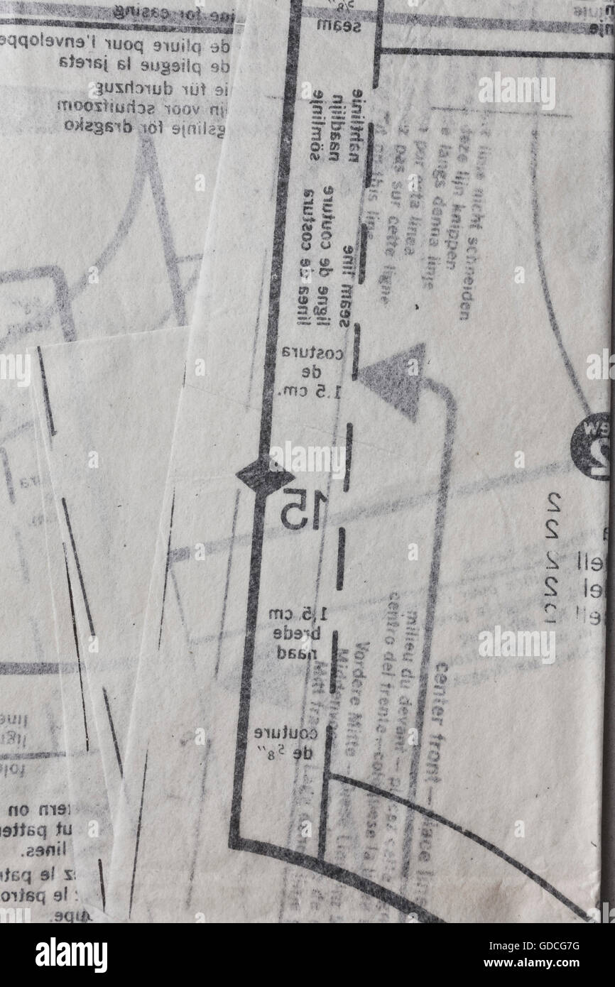 Sewing pattern on thin paper background Stock Photo - Alamy