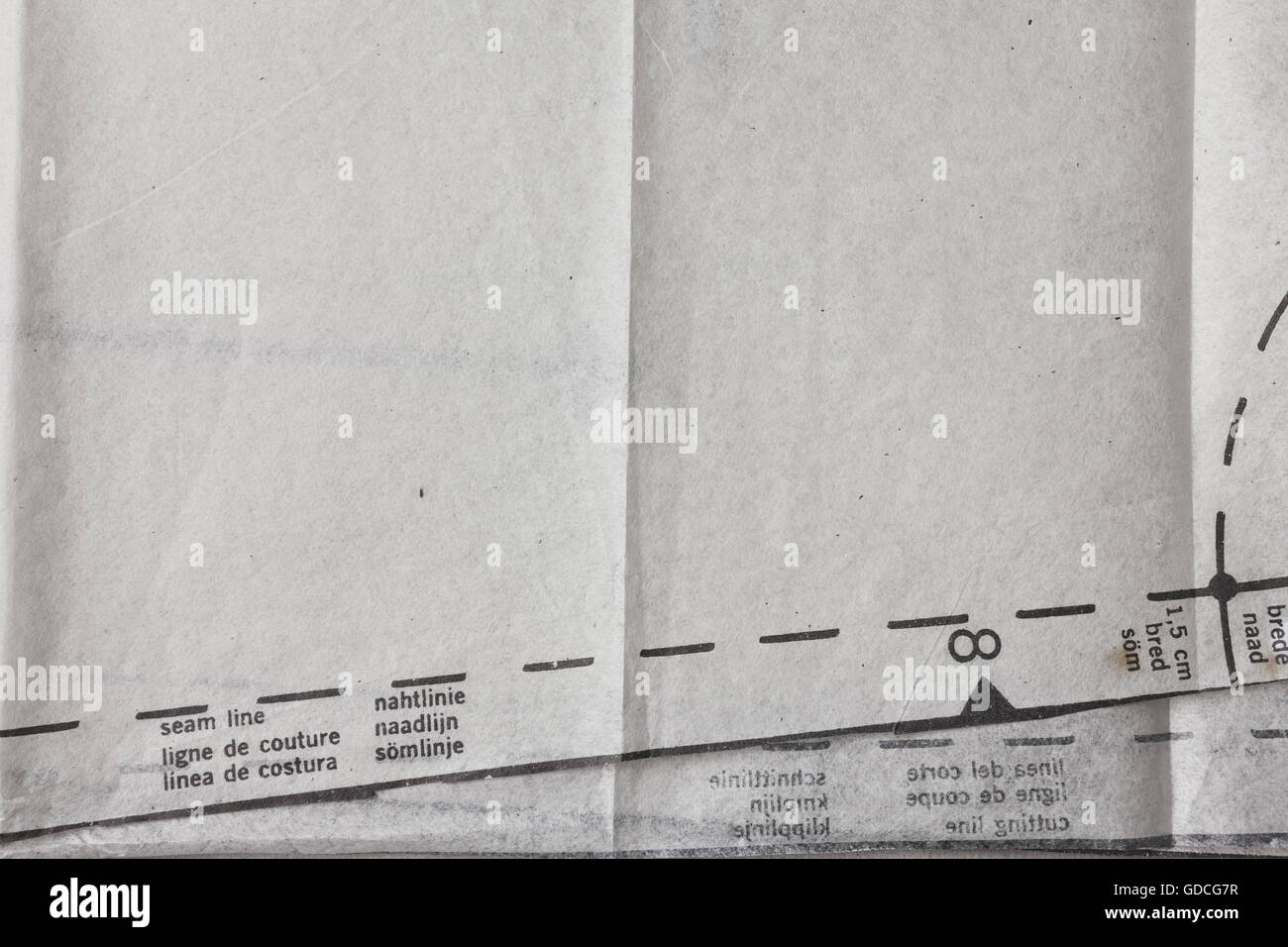 Sewing pattern on thin paper background Stock Photo - Alamy