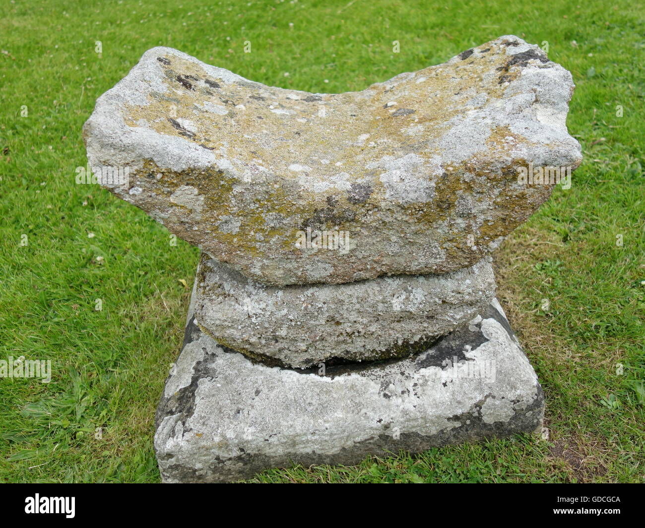 An old stone seat Stock Photo - Alamy