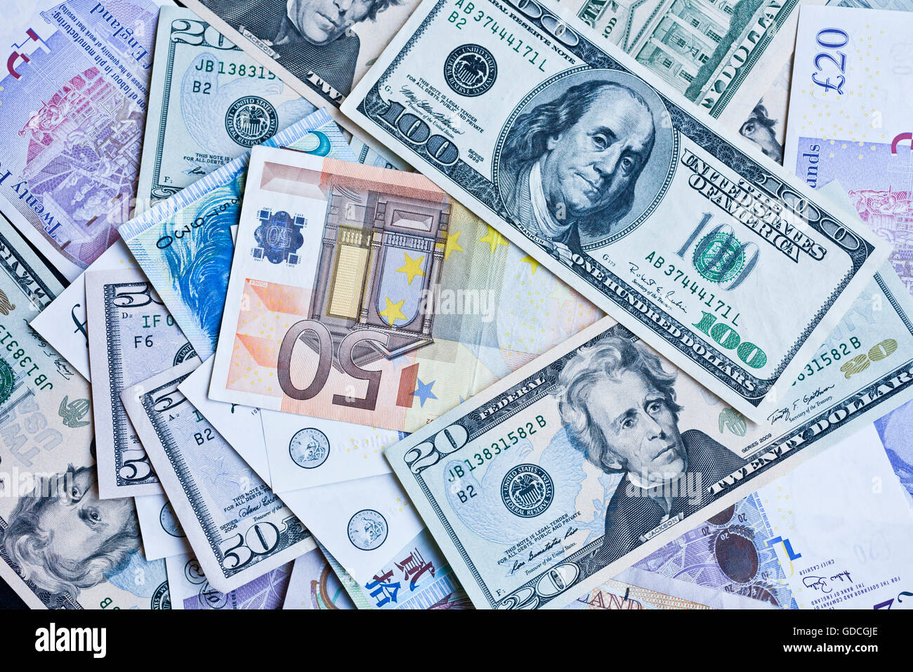 International currencies pile hi-res stock photography and images - Alamy